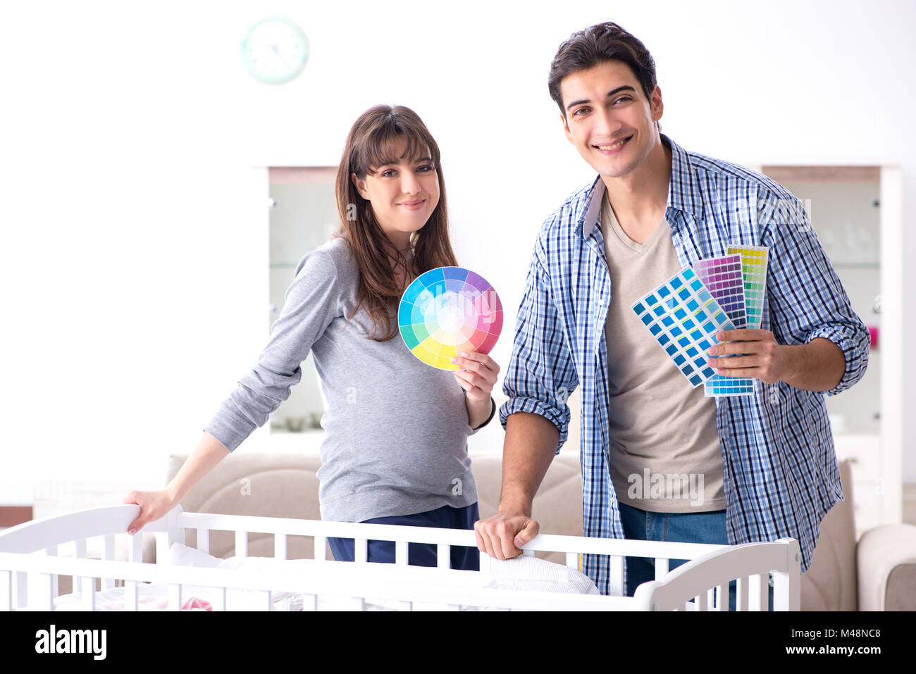 Young parents expecting their first baby Stock Photo - Alamy