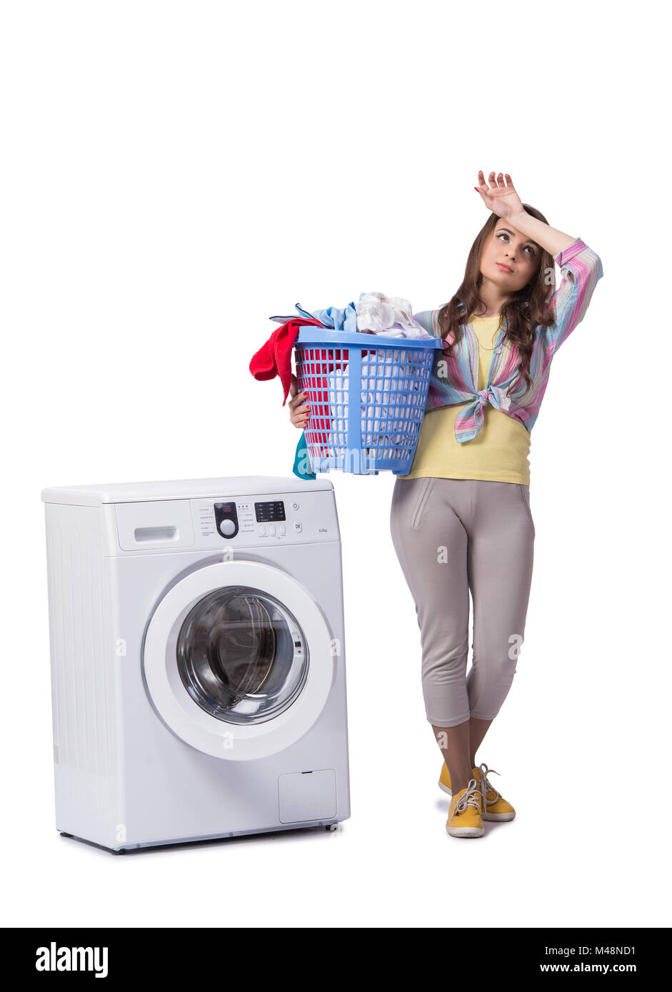 Woman tired after doing laundry isolated on white Stock Photo - Alamy