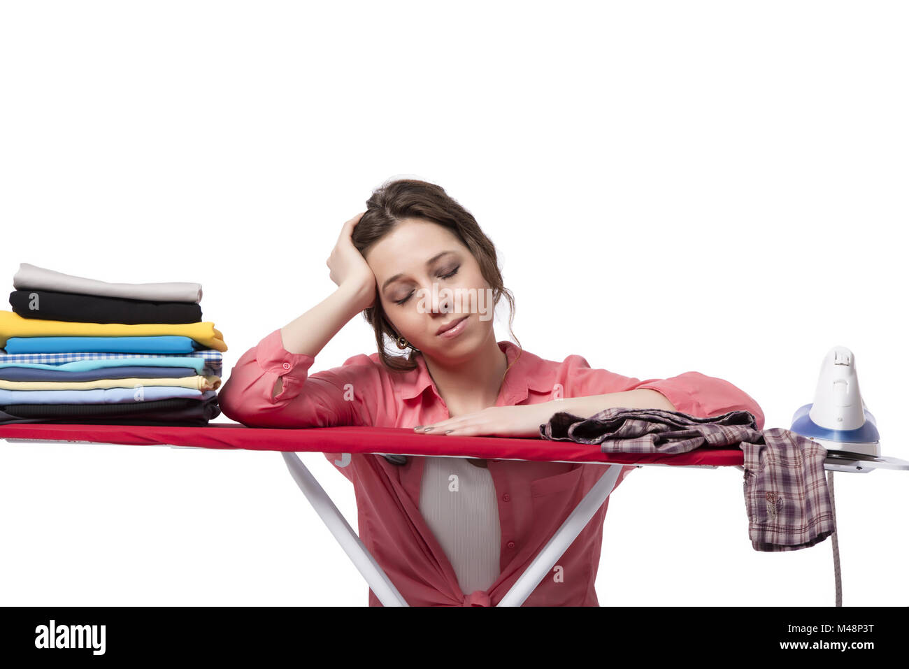 The young woman doing ironing isolated on white Stock Photo - Alamy