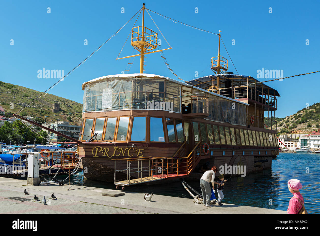 Tourist ship in the Balaclava Bay. Former submarine base Stock Photo ...