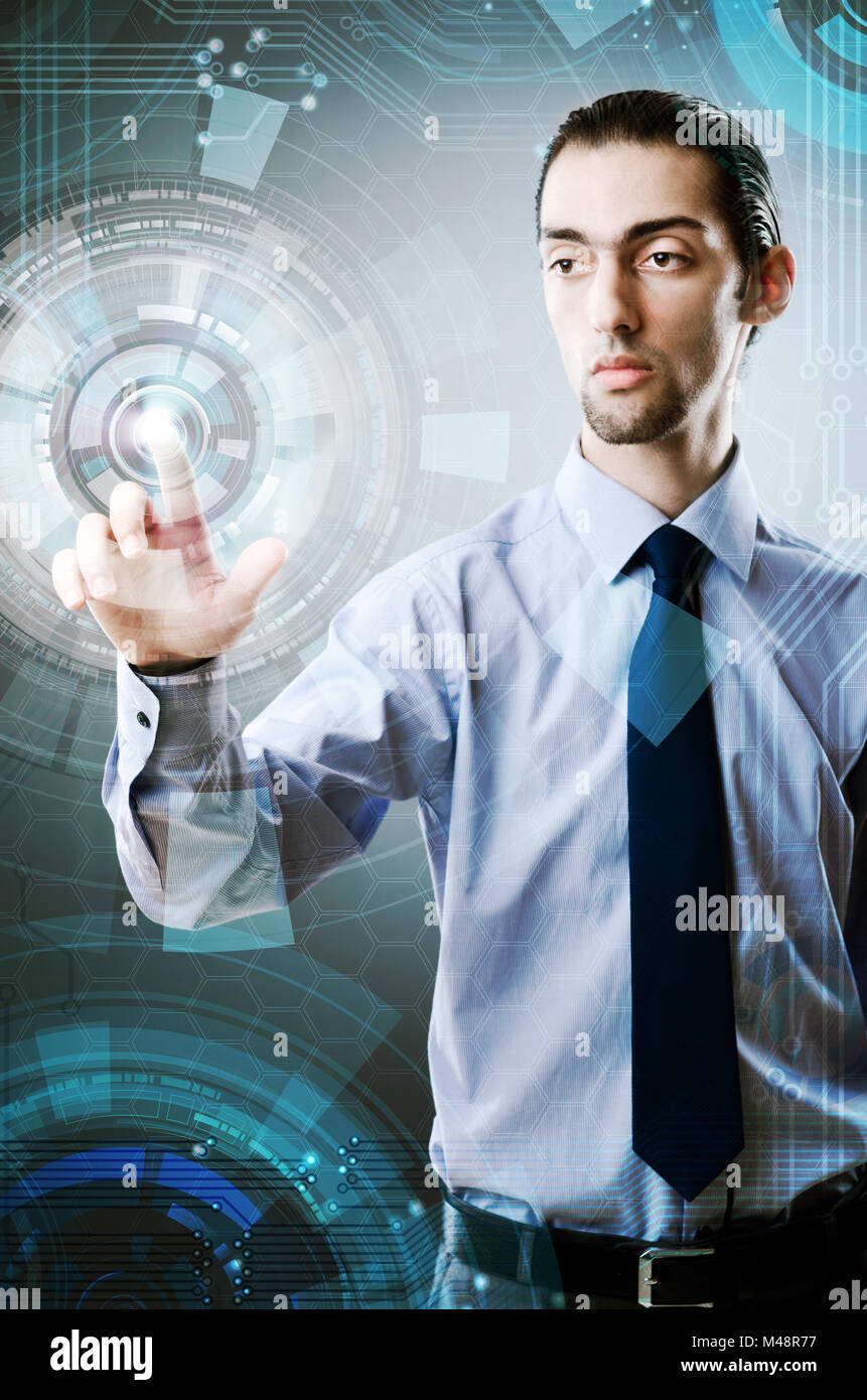 Businessman pressing virtual buttons in futuristic concept Stock Photo ...