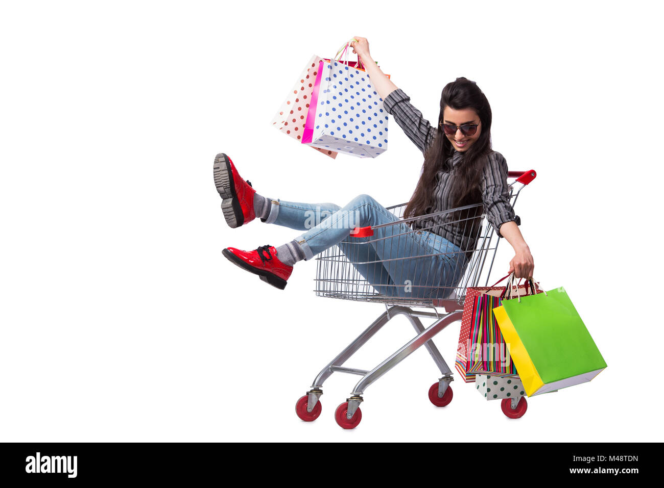 Young woman happer after shopping isolated on white Stock Photo - Alamy