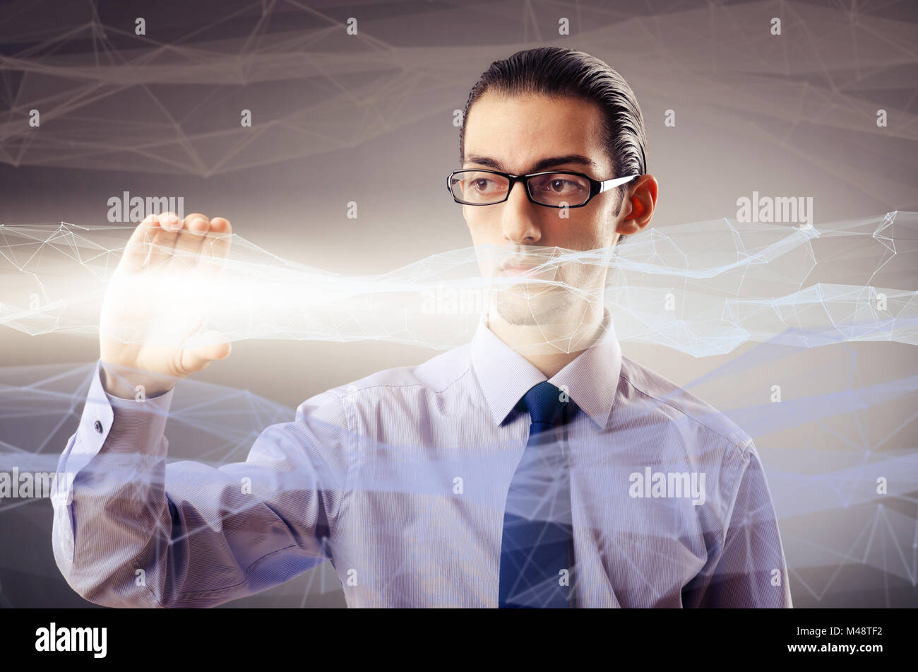 Businessman pressing virtual buttons in futuristic concept Stock Photo ...