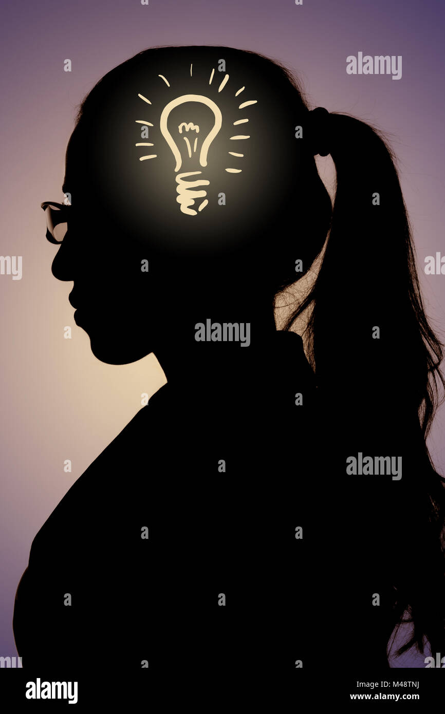 Bright idea concept with light bulb and woman Stock Photo - Alamy