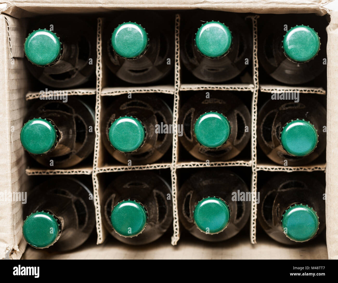 twelve beer bottles in cardboard box Stock Photo - Alamy