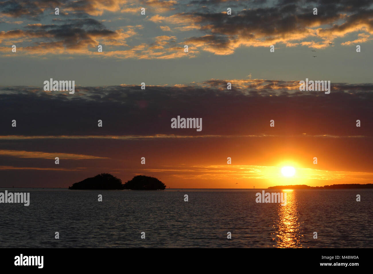 SUN Florida Bay sunset EVER Stock Photo - Alamy