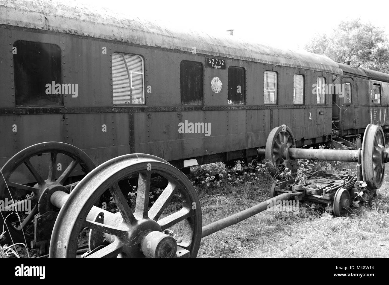 old train wagons and unit chassis black-white Stock Photo - Alamy