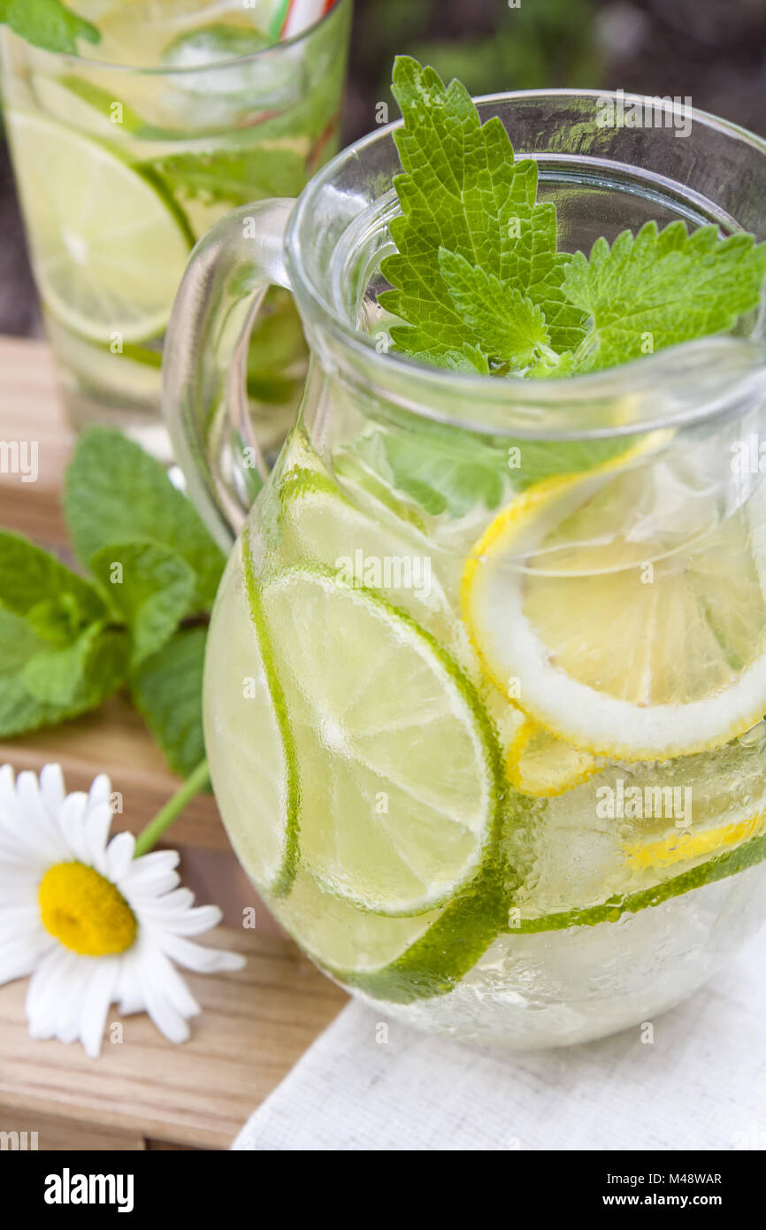 Cold fresh lemonade with lemon, lime and mint Stock Photo - Alamy