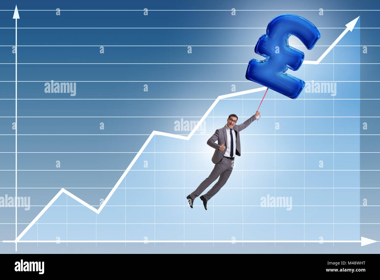 Businessman flying on british pound sign inflatable balloon Stock Photo ...