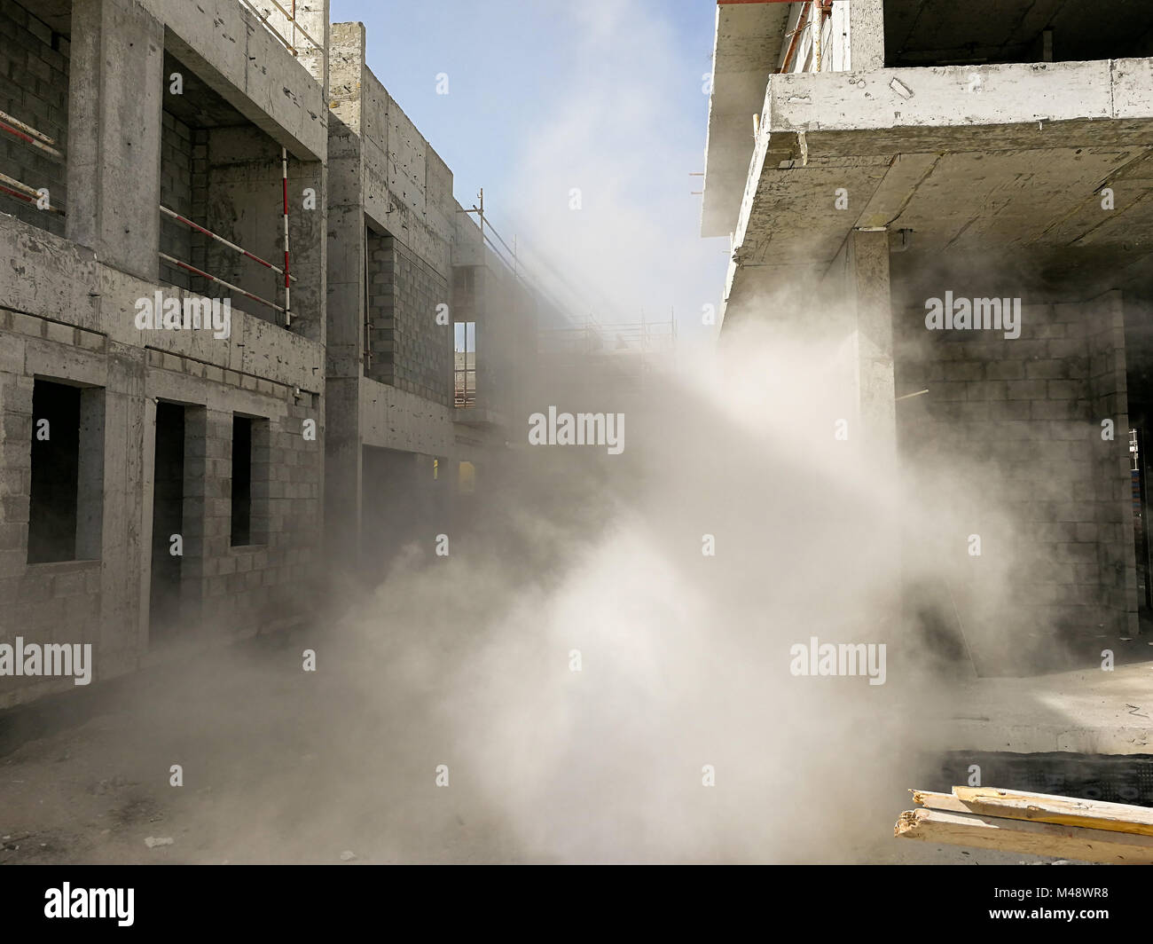 Construction Dust in the air Polluting the environment Stock Photo - Alamy