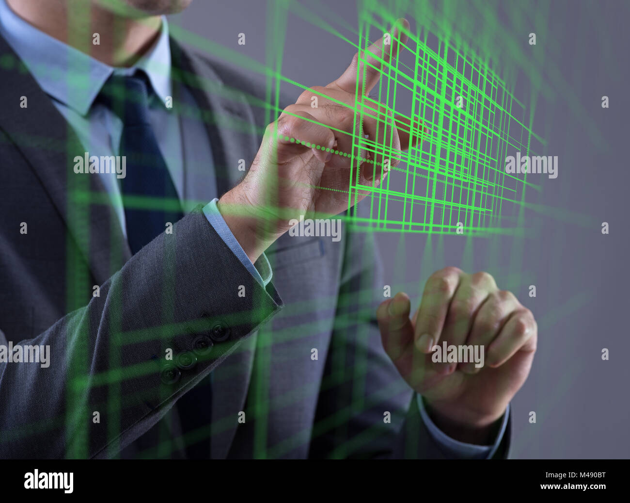 Businessman pressing virtual buttons in futuristic concept Stock Photo ...