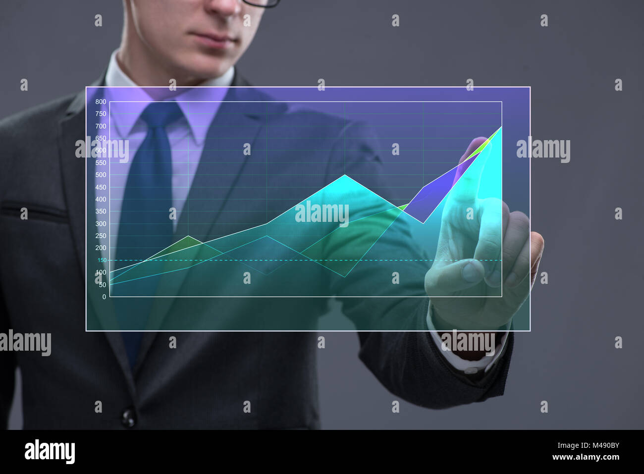 Businessman working with graph in business concept Stock Photo - Alamy