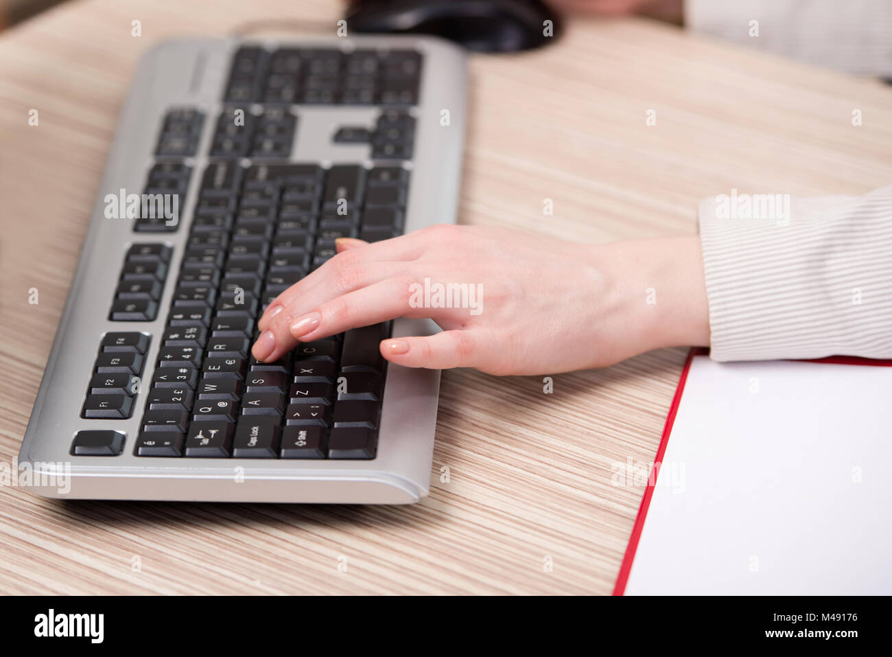 Hands working on the keyboard in the office Stock Photo - Alamy
