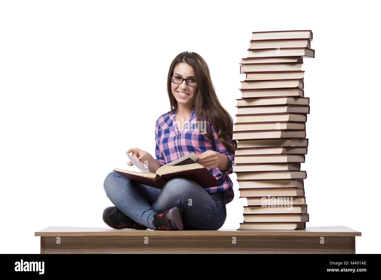 Young student preparing to the college exams isolated on white Stock ...