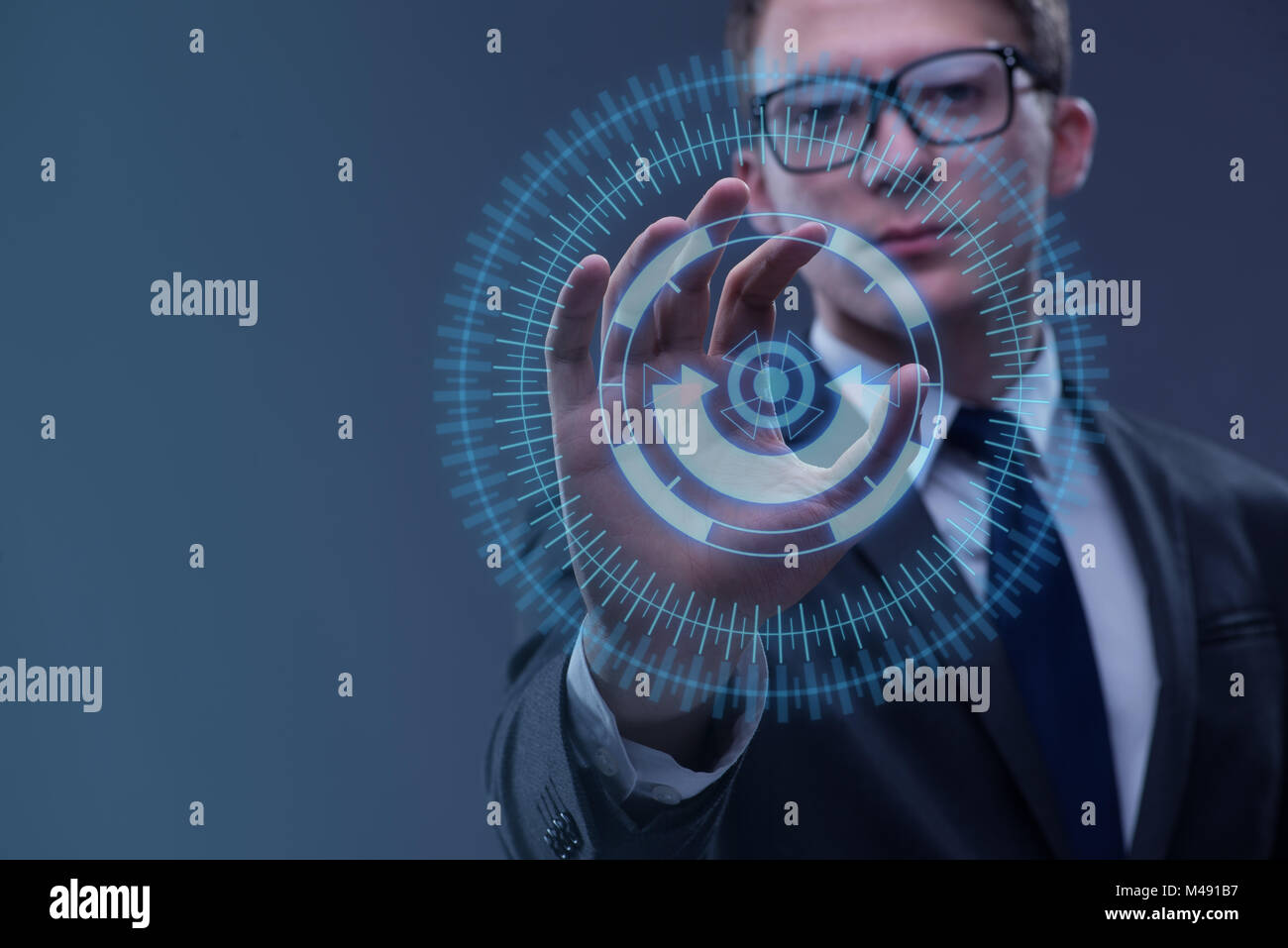 Businessman pressing virtual buttons in futuristic concept Stock Photo ...