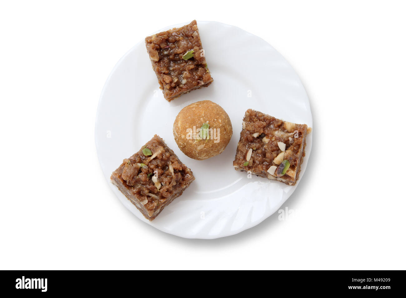 Indian sweets on plate hi-res stock photography and images - Alamy
