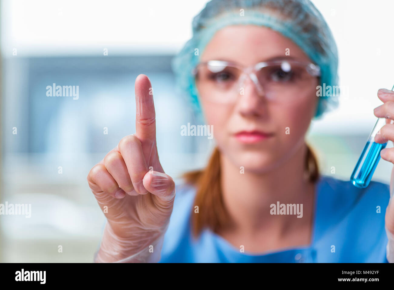 Young student working with chemical solutions in lab Stock Photo - Alamy