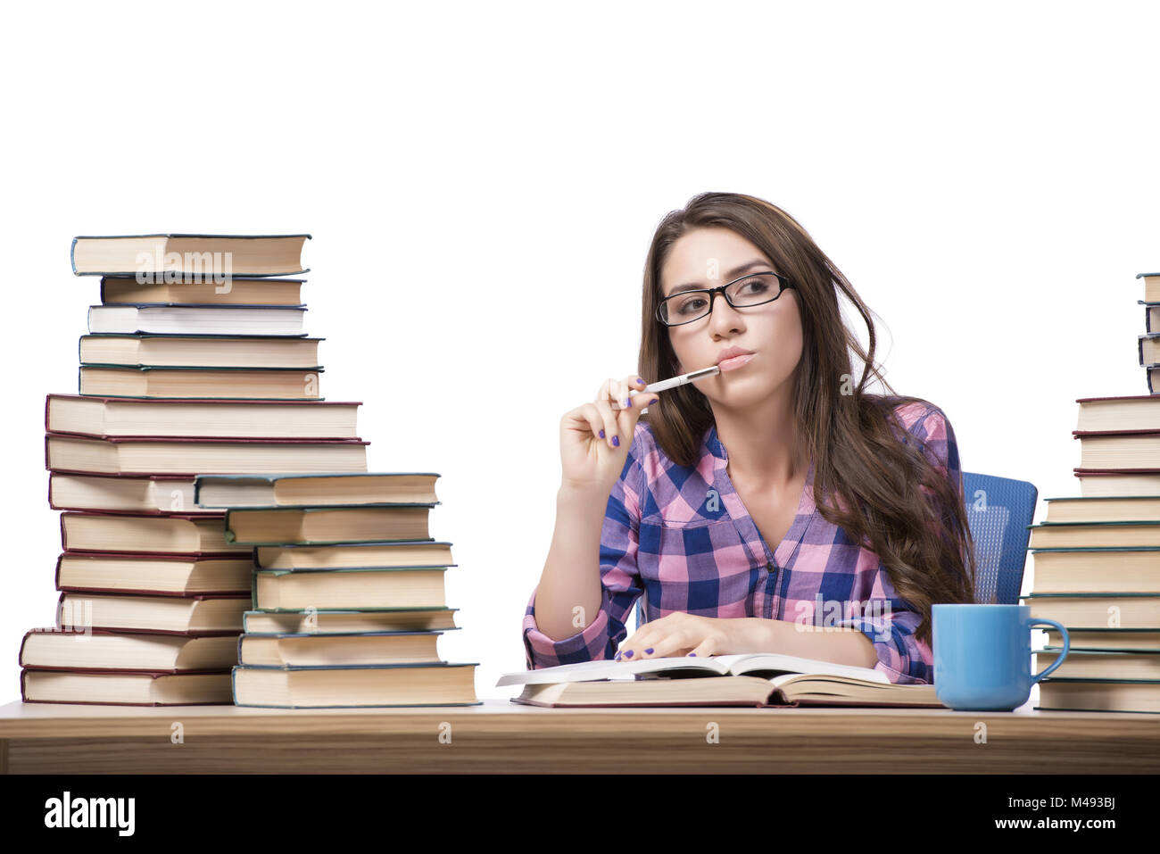Young student preparing to the college exams isolated on white Stock ...