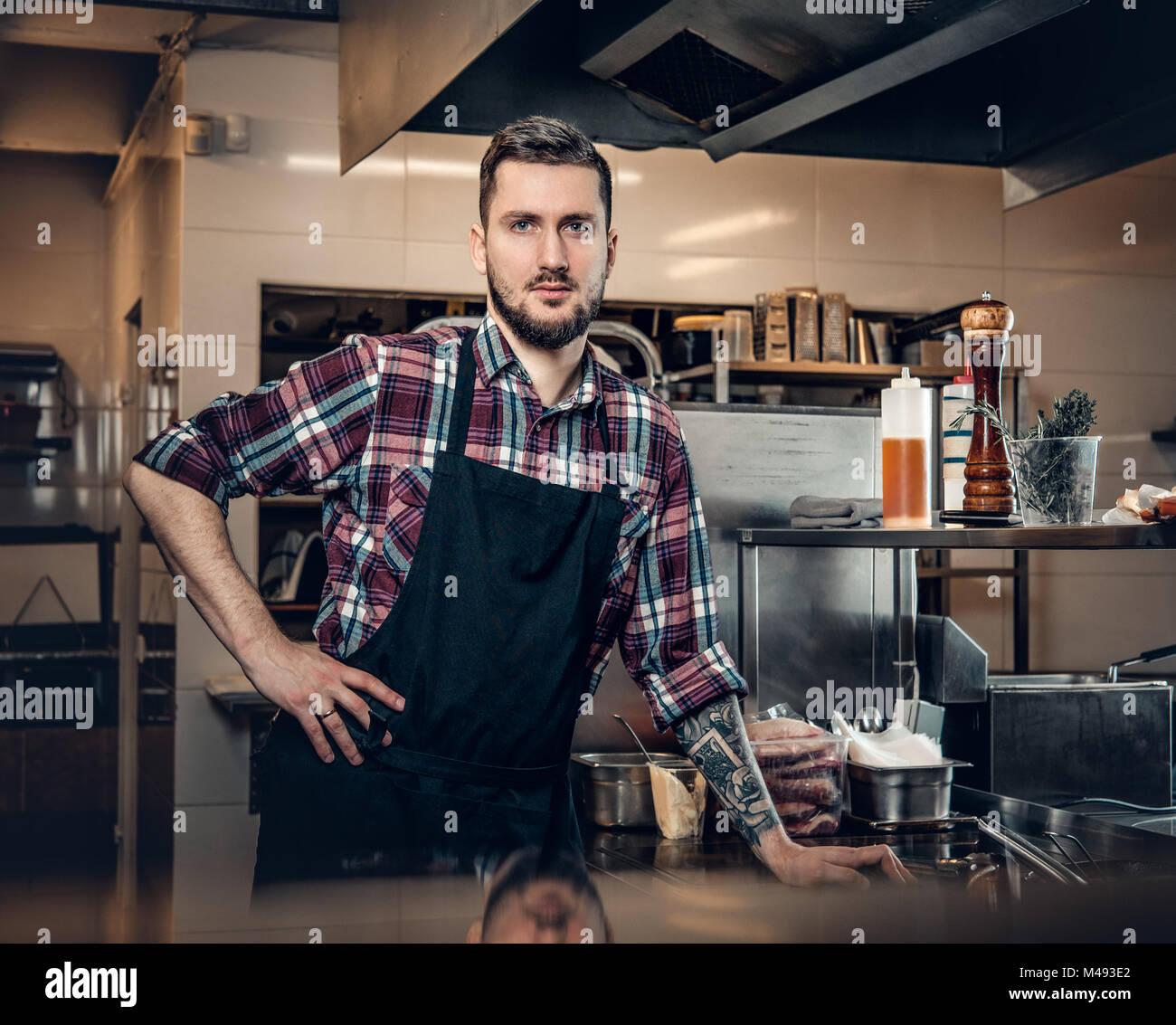 Portrait of master chef in a kitchen Stock Photo - Alamy