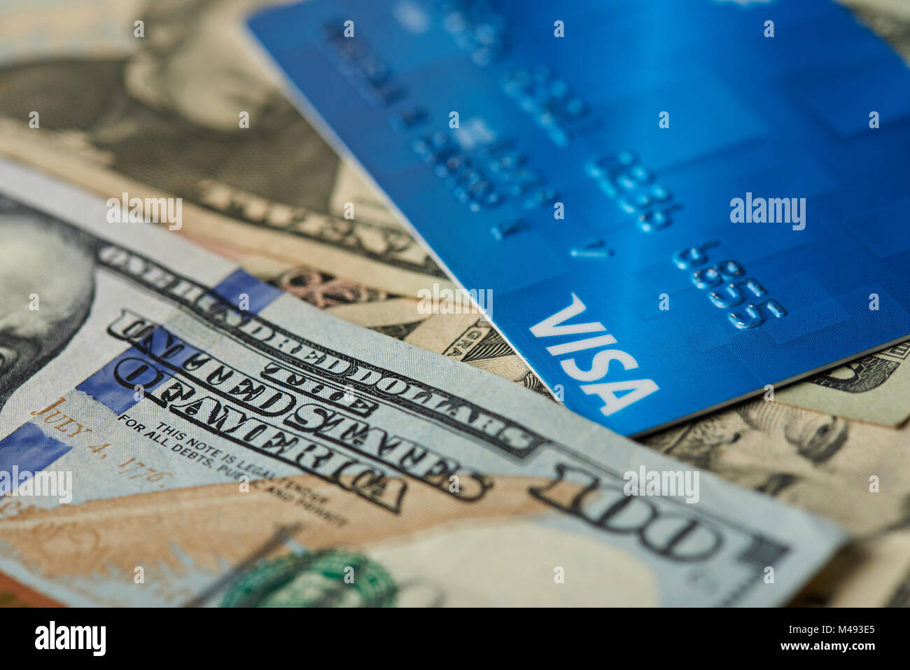 New york, USA - August 24, 2017:Close-up of visa card on dollar bill ...