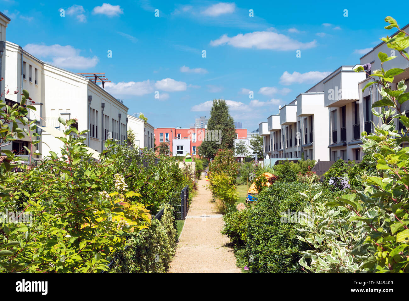 New neighborhood with gardens seen in Berlin, Germany Stock Photo - Alamy