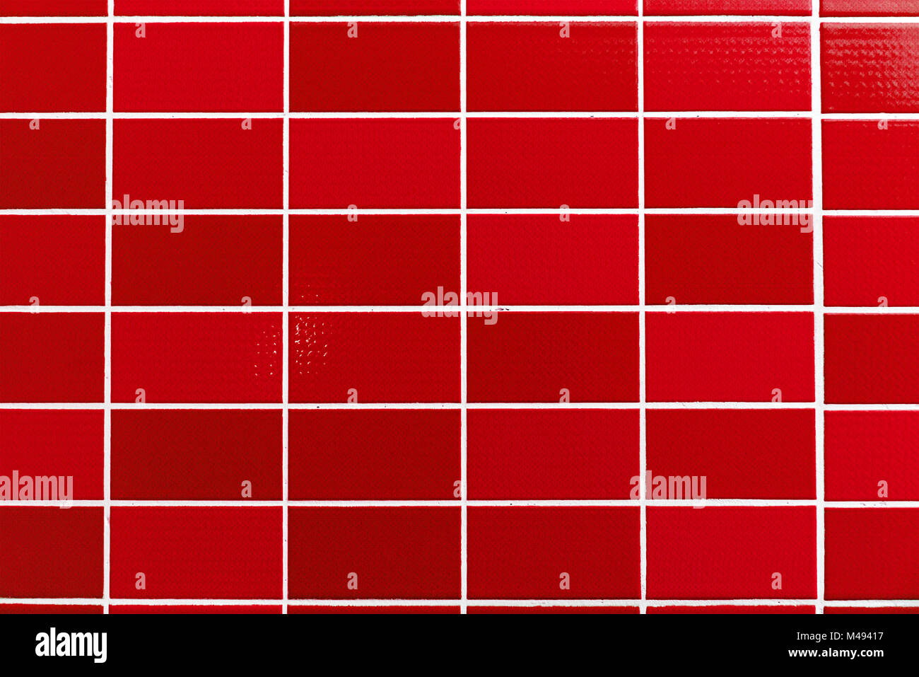 A red tiled background with relatively small tiles Stock Photo - Alamy