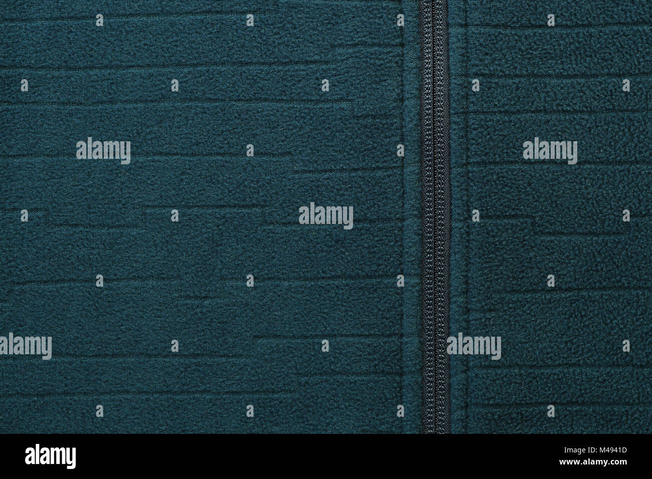 Green textile with zipper closeup. Green textile texture. Copy space on ...