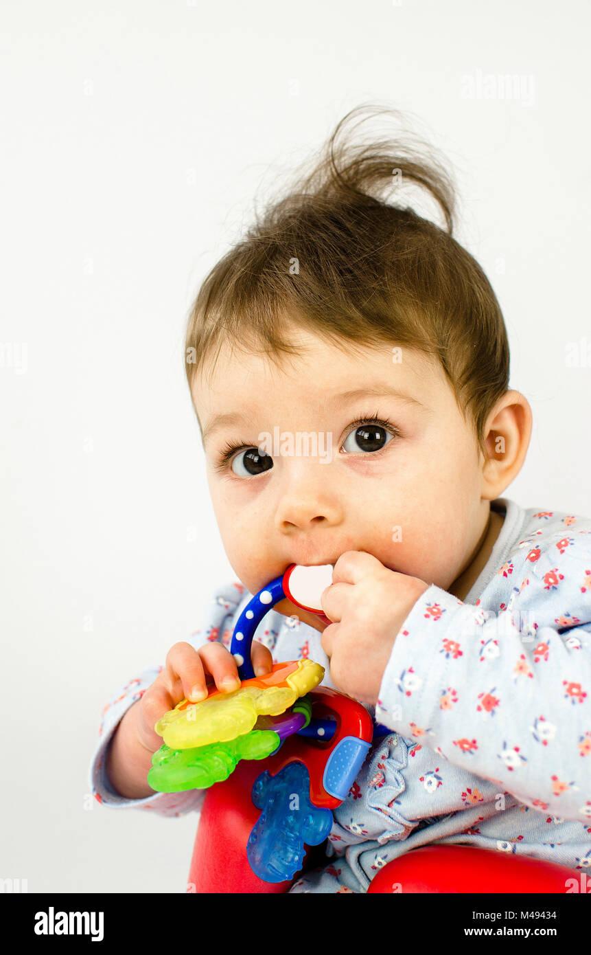 teething baby girl Stock Photo - Alamy