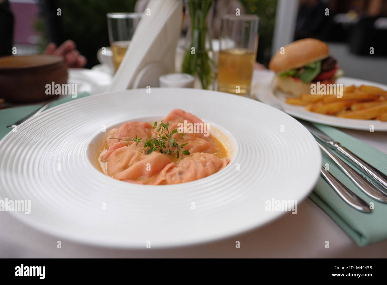 Ravioli at restaurant table Stock Photo - Alamy