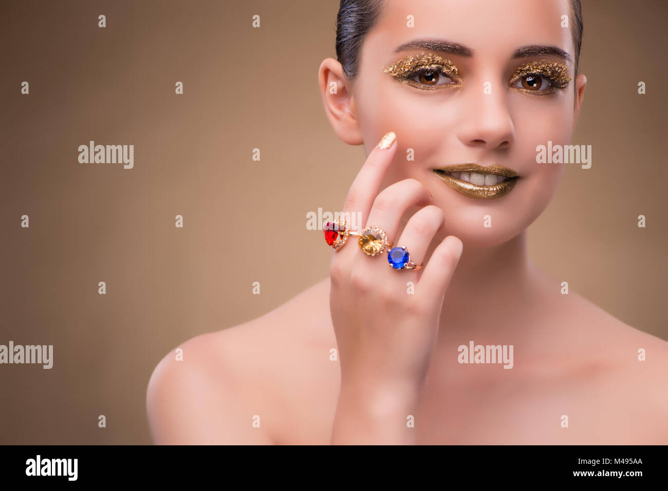 Elegant woman with jewellery in fashion concept Stock Photo - Alamy