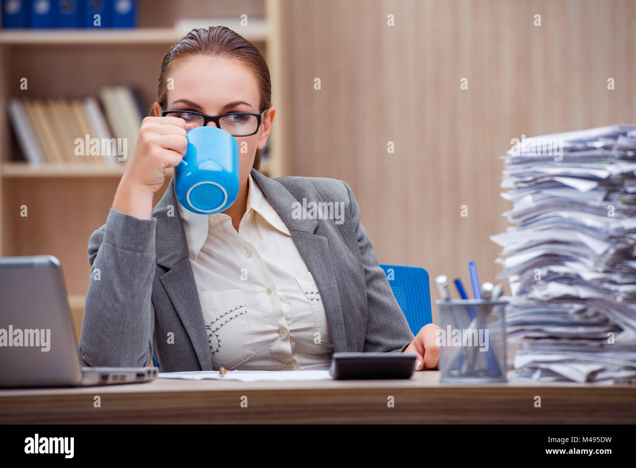 Busy stressful woman secretary under stress in the office Stock Photo ...