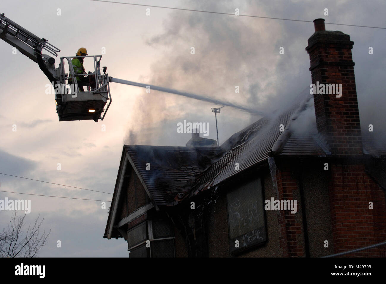 Firemen tackle house fire house in Windsor, Berkshire , England . 2006 ...