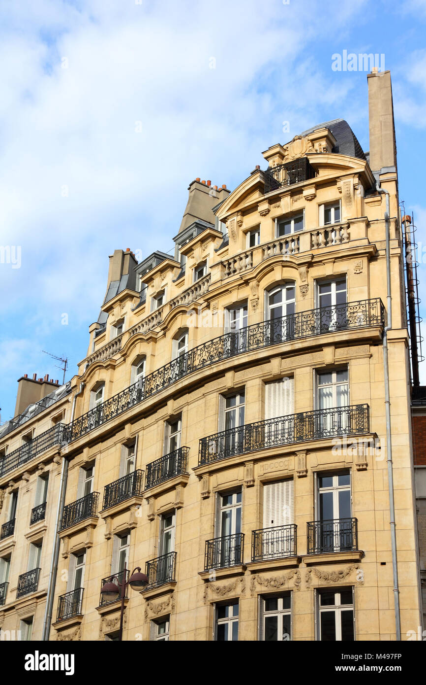 Paris, France - typical old apartment building. Windows and balconies ...
