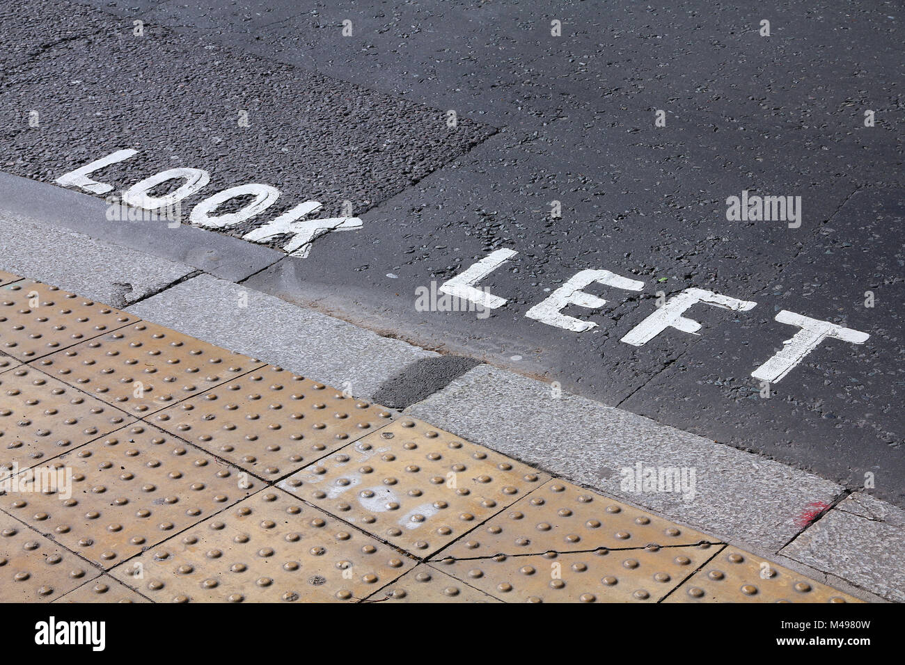 Pedestrian crossing look left sign hi-res stock photography and images ...
