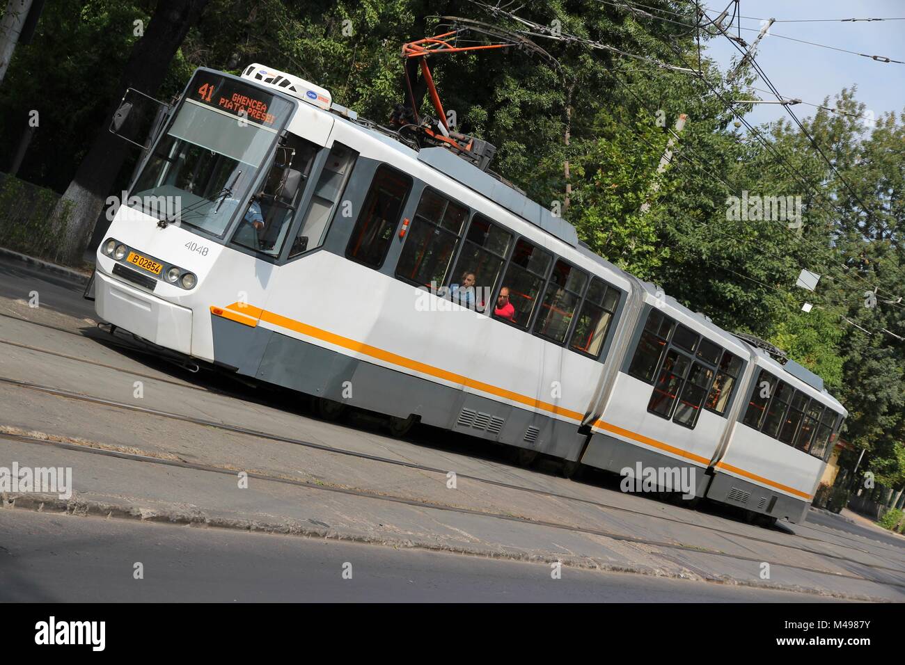 BUCHAREST, ROMANIA - AUGUST 19: Commuters ride city tram on August 19 ...