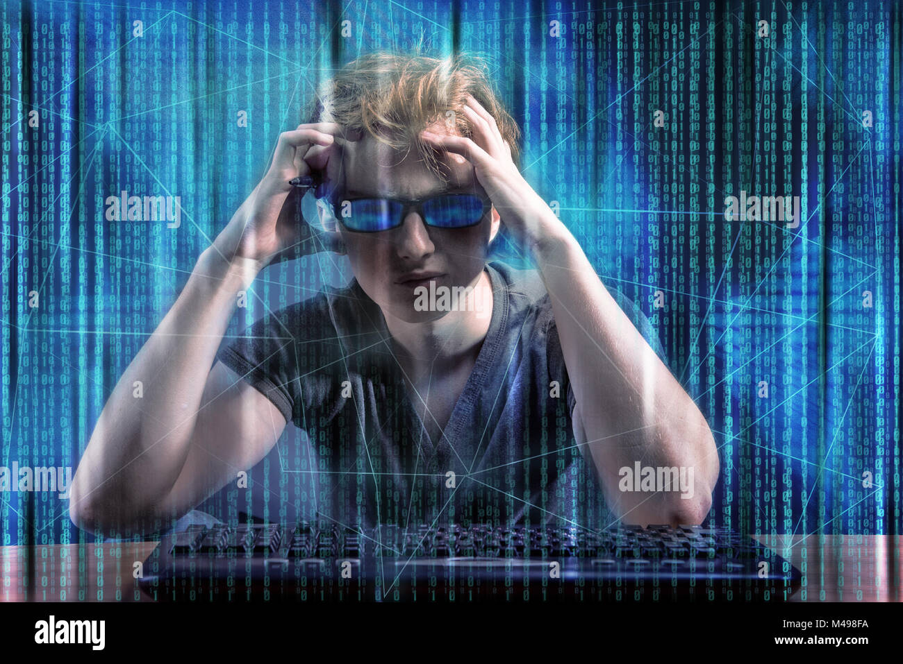 Young hacker in digital security concept Stock Photo - Alamy
