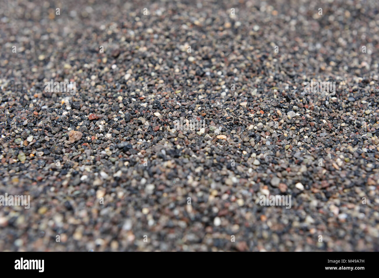 Black volcanic sand Stock Photo - Alamy