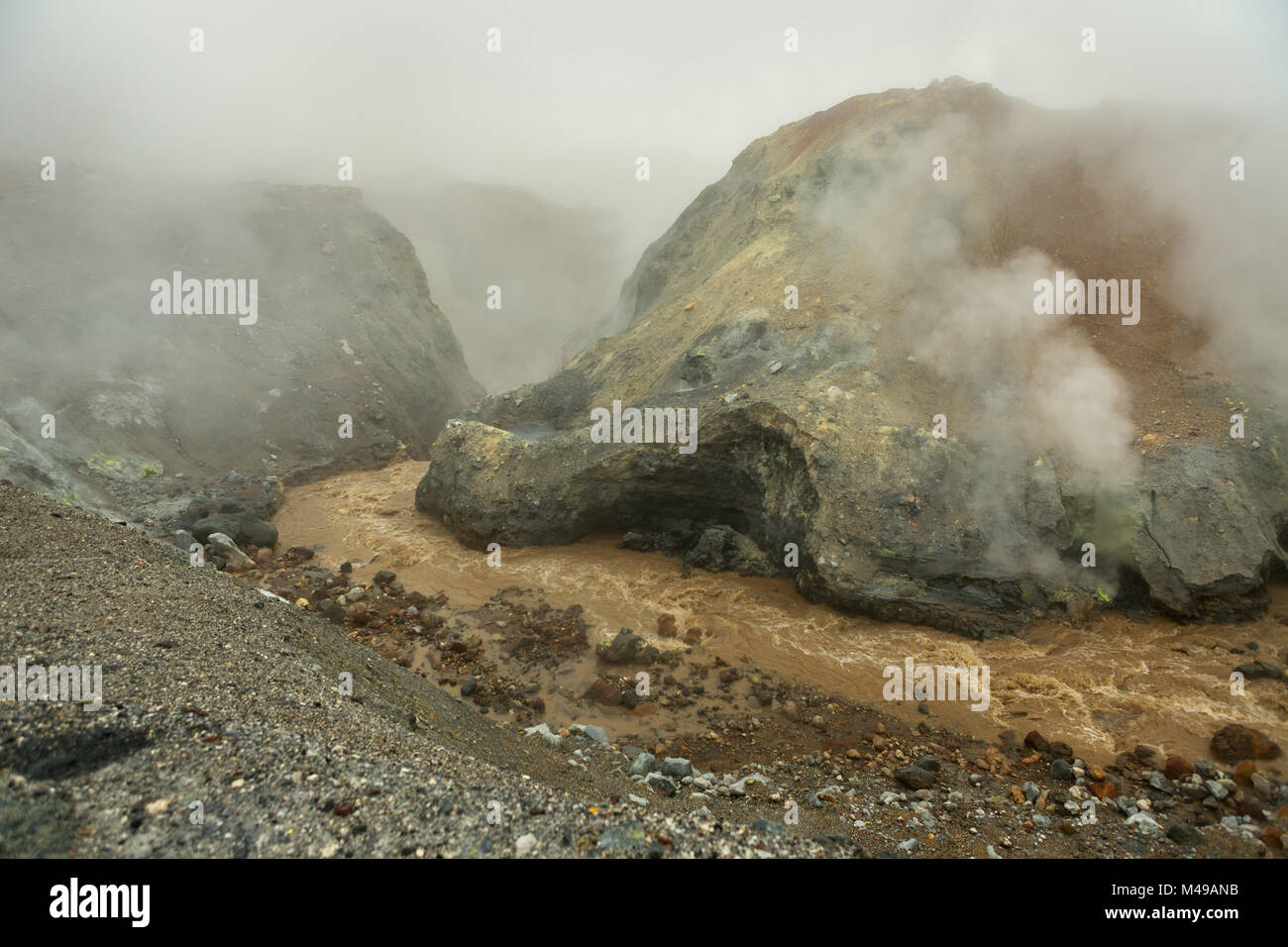 Stream from melting of glaciers on the active volcano Mutnovsky Stock ...
