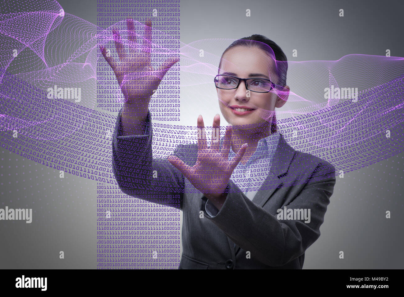 Businesswoman pressing virtual buttons in futuristic concept Stock ...