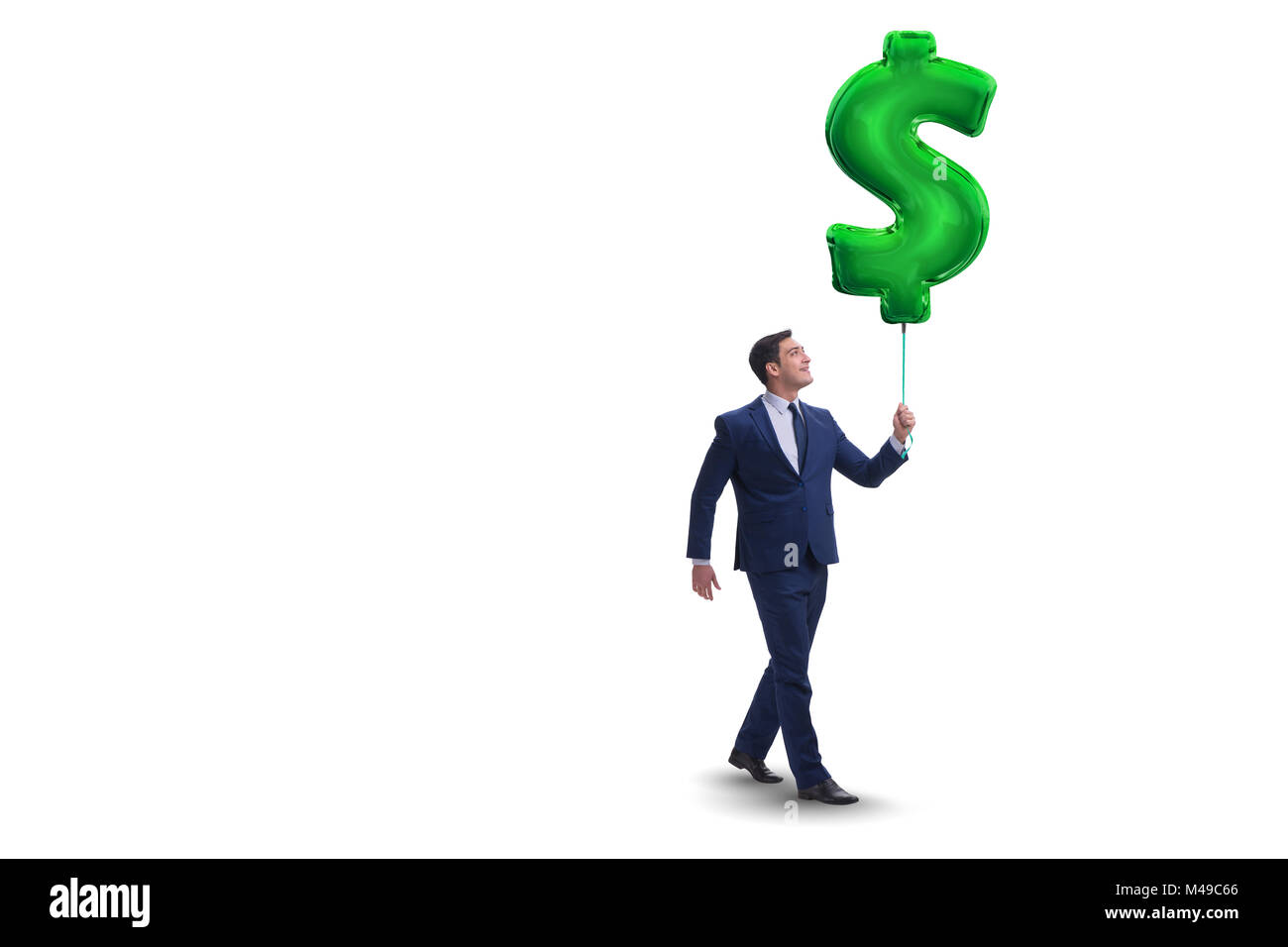 Businessman walking with inflatable dollar sign Stock Photo - Alamy