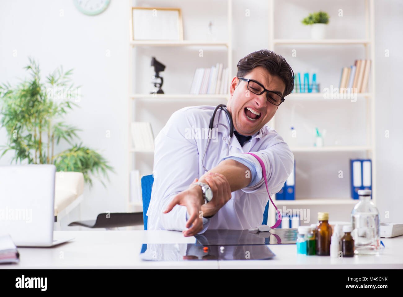Doctor drug addict in the hospital Stock Photo - Alamy