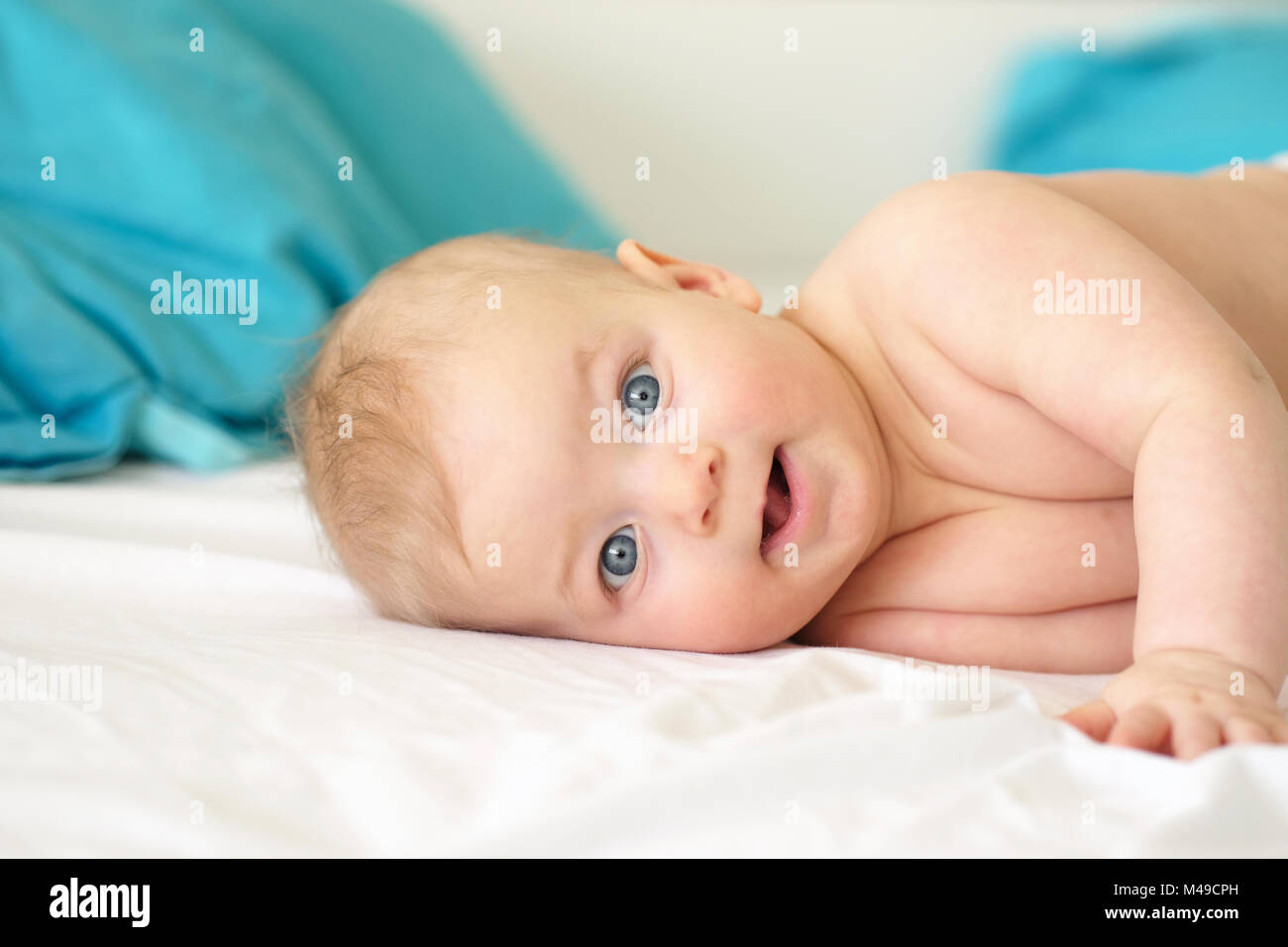 Baby with blue eyes Stock Photo - Alamy
