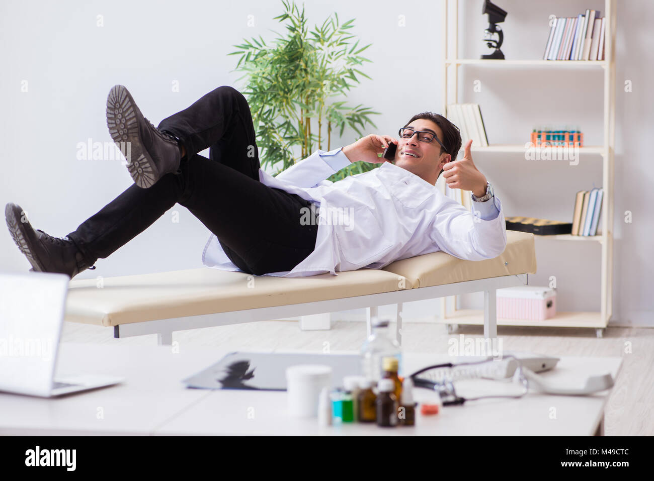 Doctor relaxing after complex surgery in hospital Stock Photo - Alamy