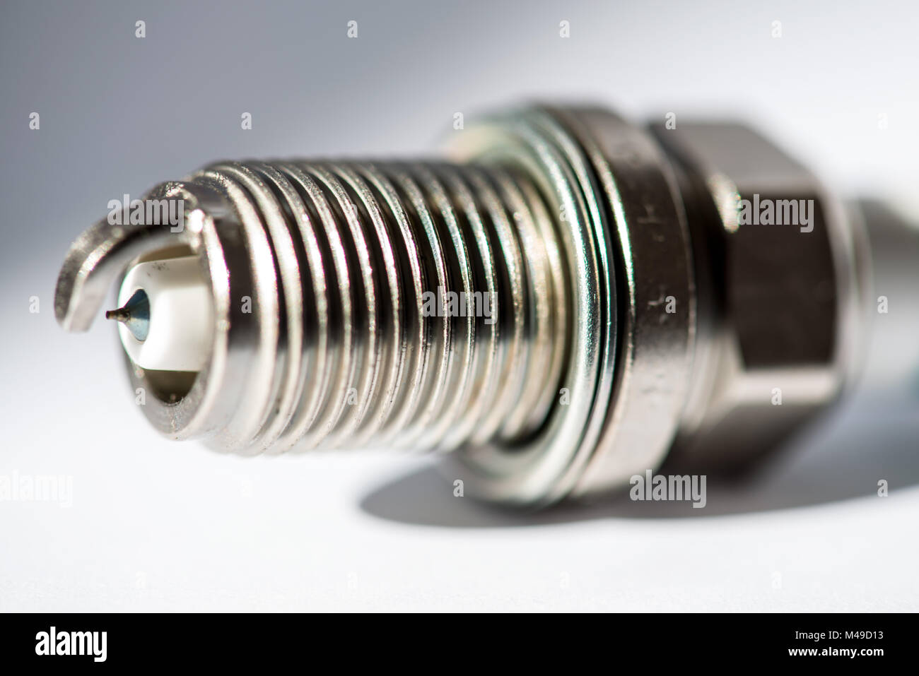new spark plug isolated on white background Stock Photo - Alamy