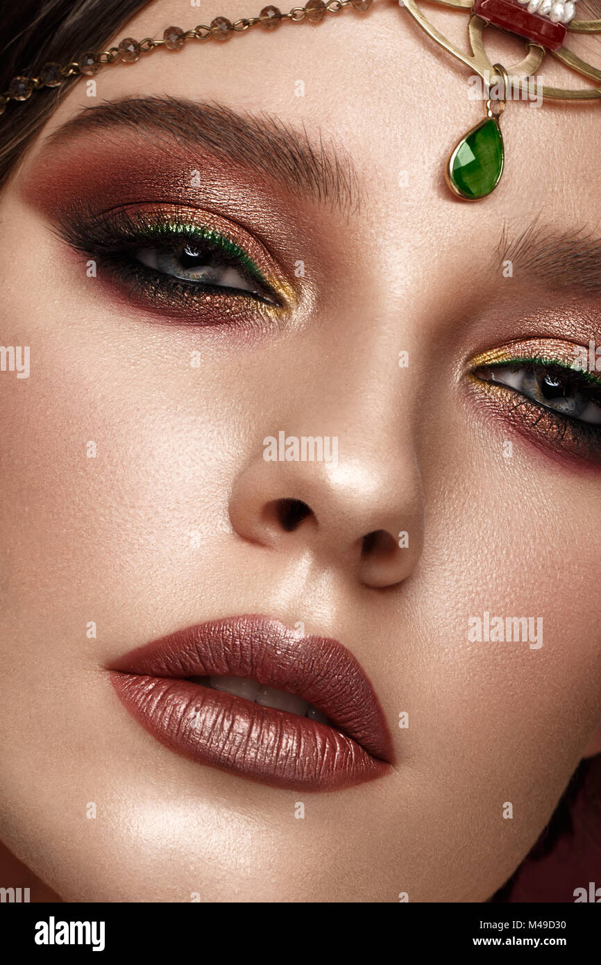 Beautiful girl with creative colorful makeup. Beauty face Stock Photo ...