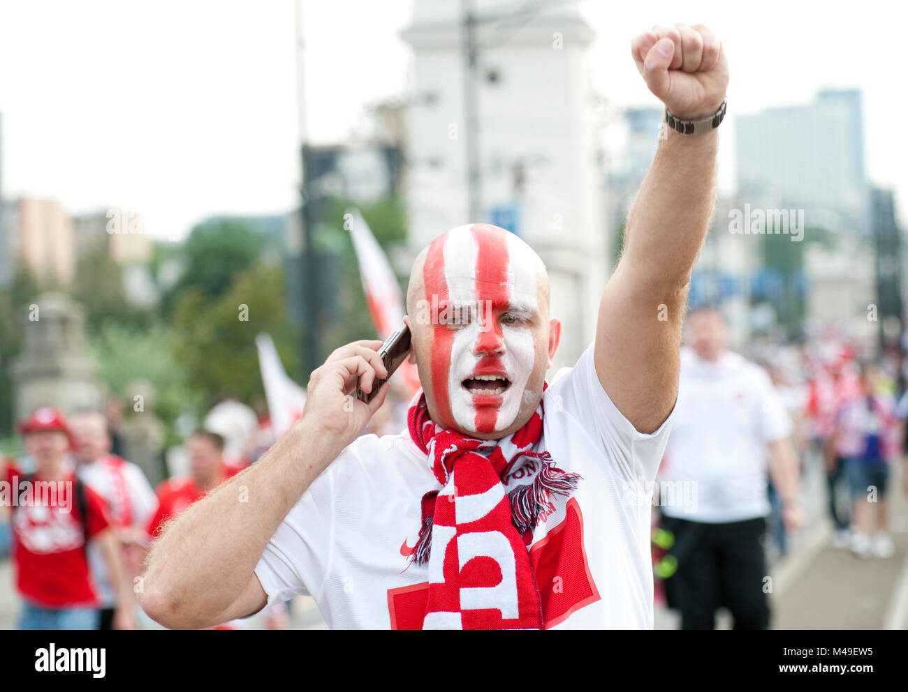 Euro 2012. Warsaw, Poland. 12th June 2012. A Polish fan walking to the ...
