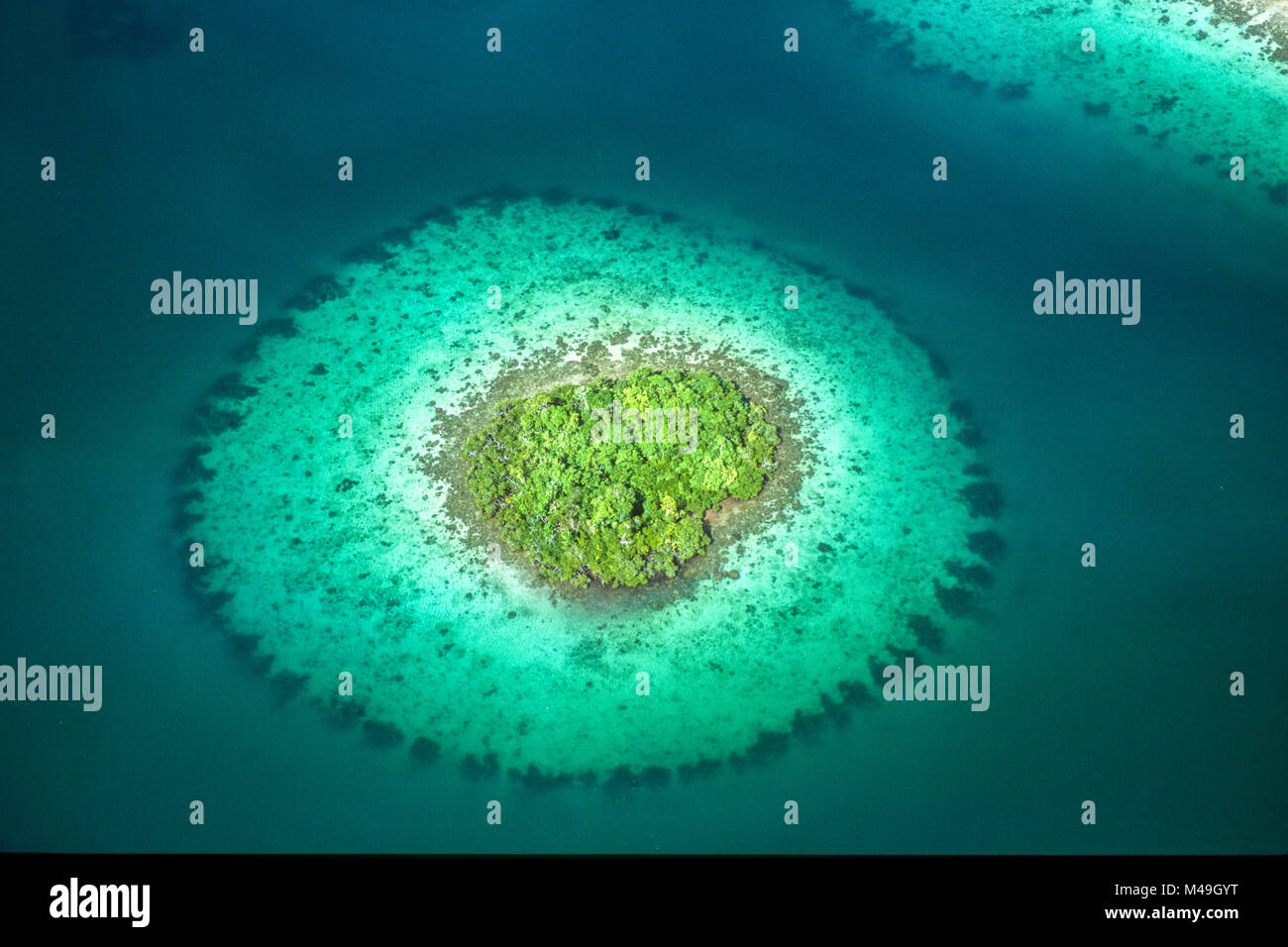 Aerial view of small coral island, Western Provinces, Solomon Islands ...