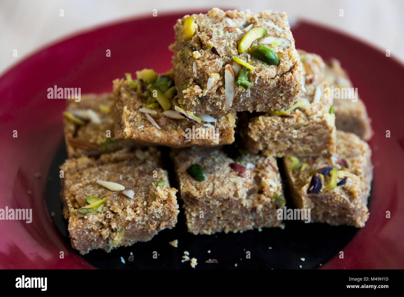 Mohanthal (sweetened gram flour fudges made with Ghee, and flavored ...