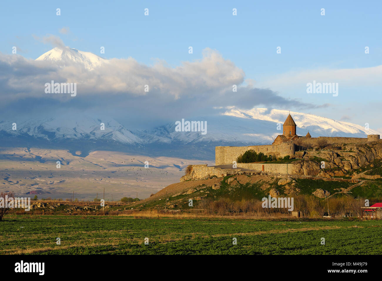 Ancient monastery in front of mountain Stock Photo - Alamy