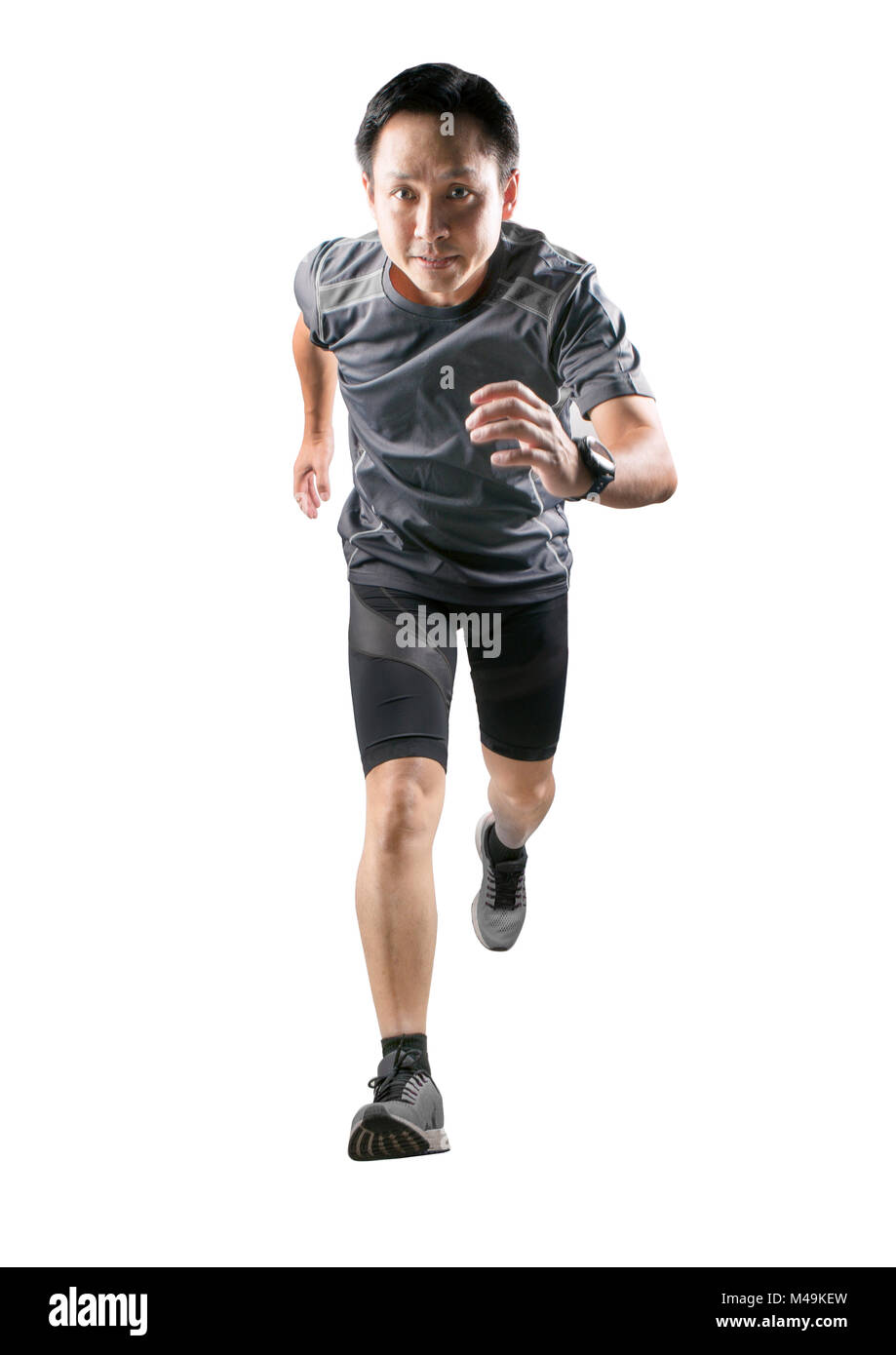 portrait of asian running man isolated white background Stock Photo - Alamy